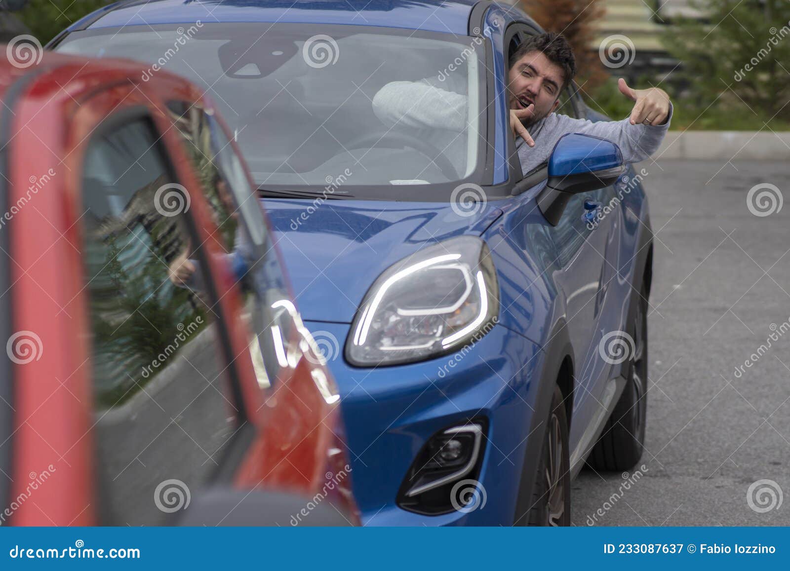 Angry Man in the Car in the Queue Yells at the Driver in Front Stock ...