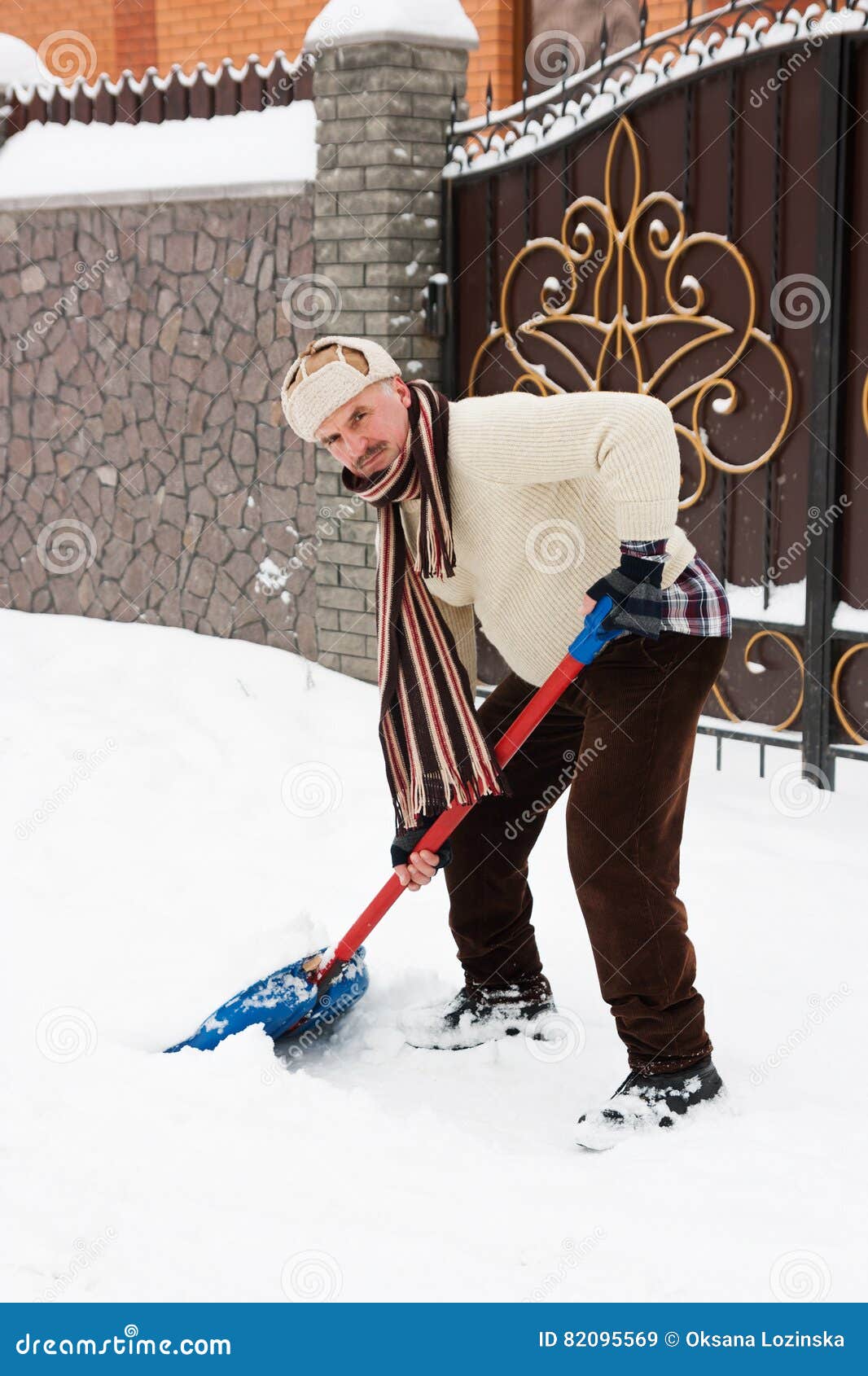 Angry man clears snow stock image. Image of human, fence - 82095569