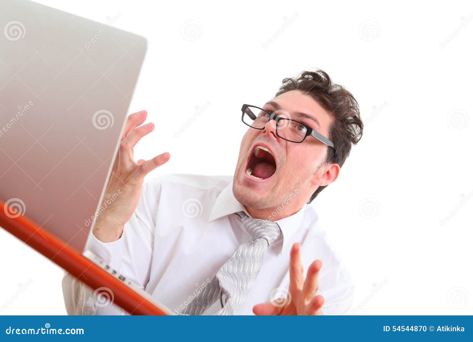 Angry man with computer stock photo. Image of notebook - 54544870