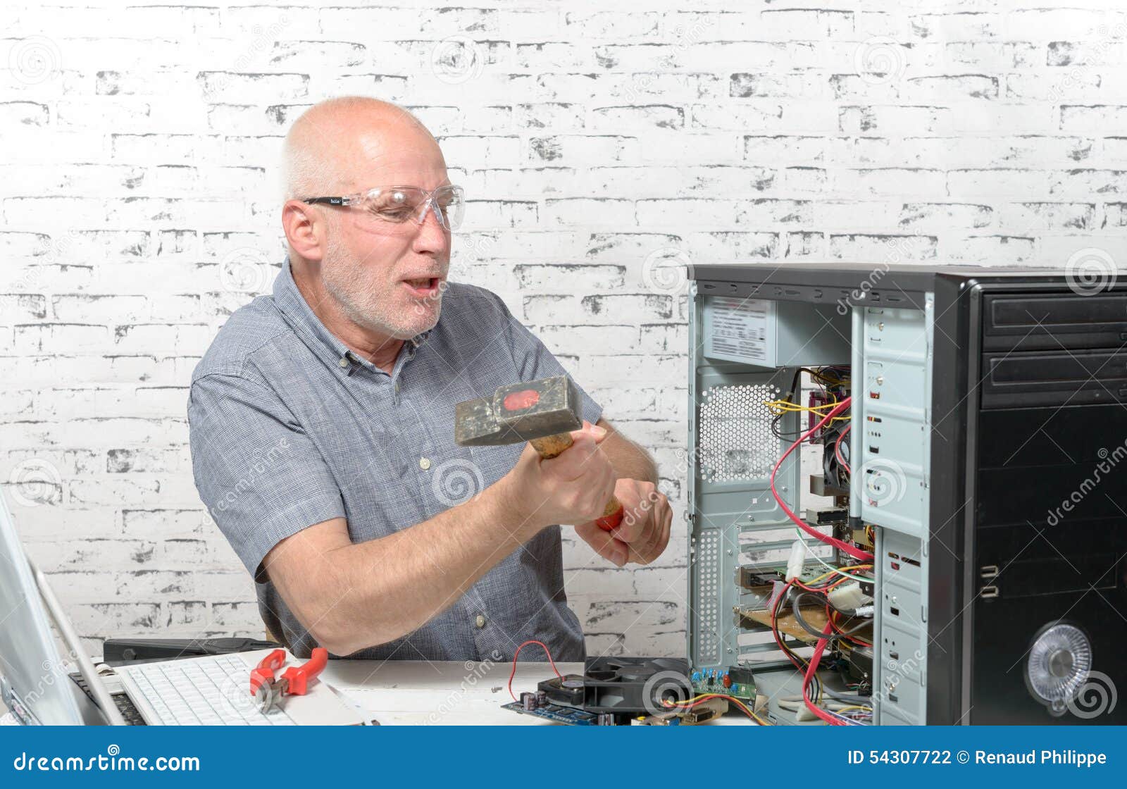 An Angry Man Destroy His Computer Stock Photo - Image of software ...