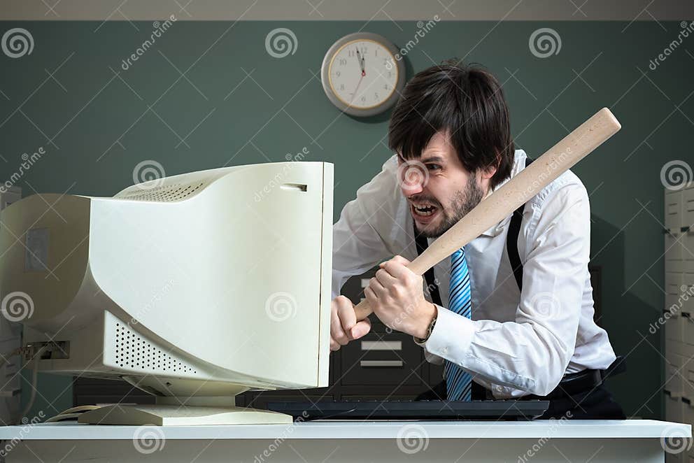 Angry Man is Destroying Old Computer with Baseball Bat in Office. Stock ...