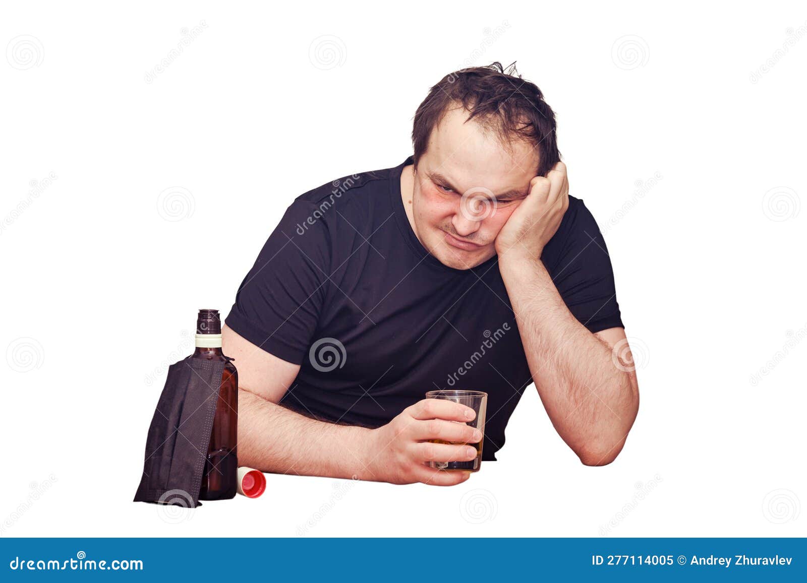 Angry Man Drinks Alcohol Sitting with a Bottle of Whiskey at the ...