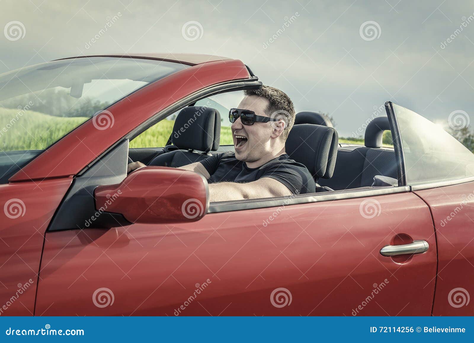 Angry man driving a car. stock photo. Image of enraged - 72114256