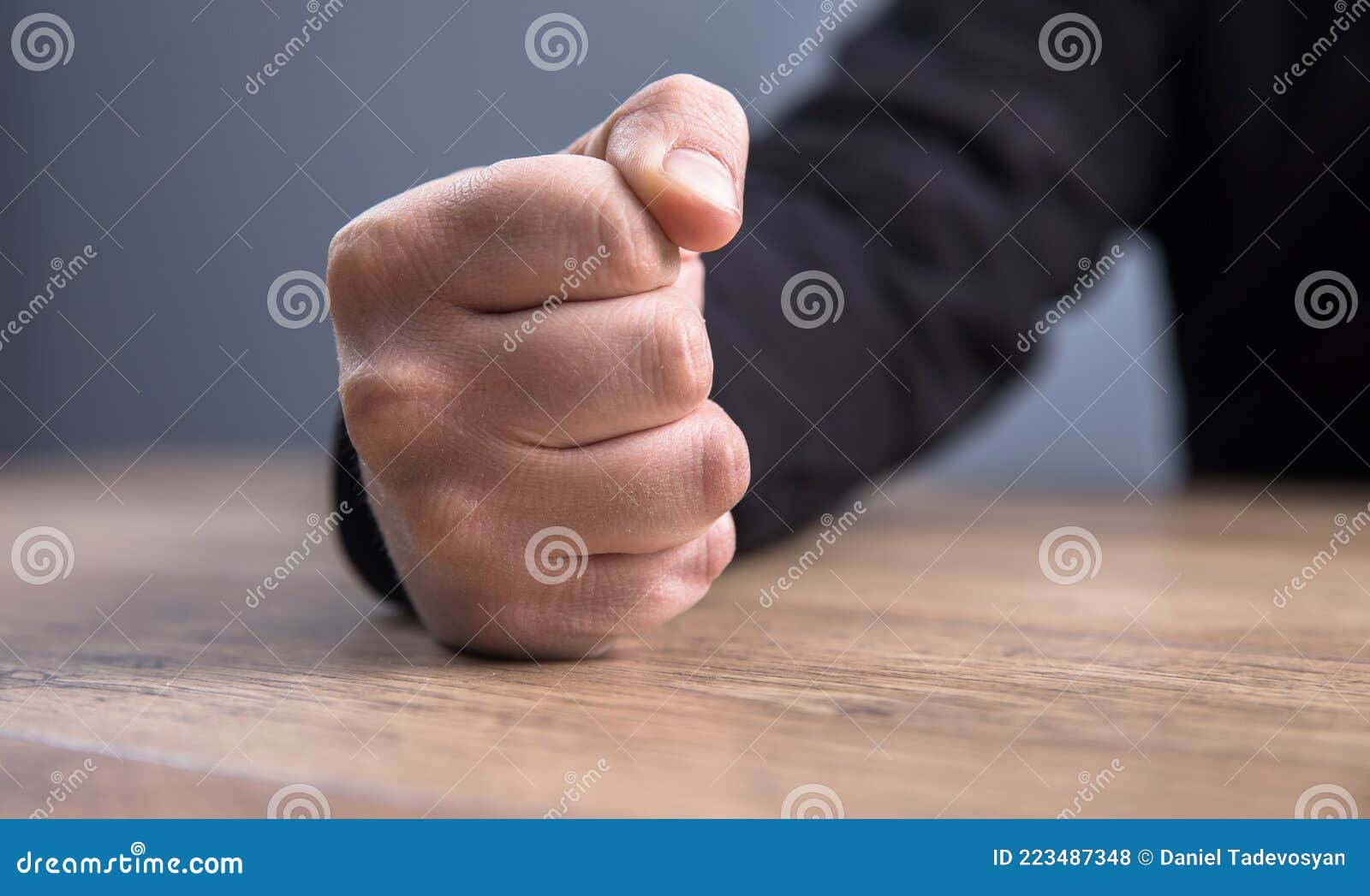 Angry man fist stock photo. Image of wooden, symbol - 223487348