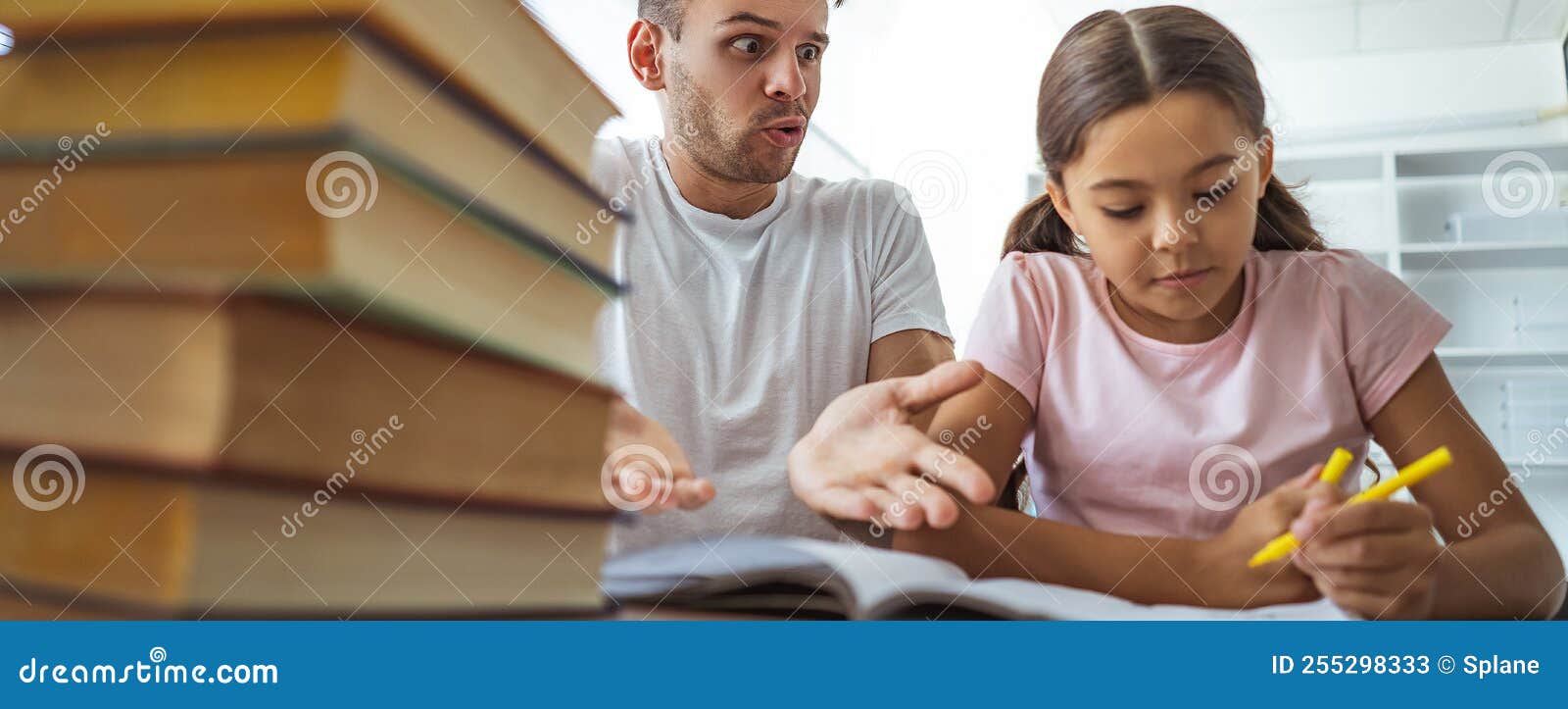 The Angry Man and a Girl Doing Homework at the Desk. Stock Image ...