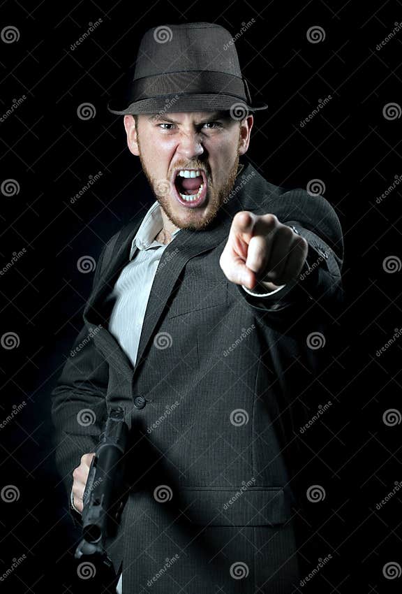 Angry Man with Gun stock image. Image of expressive, suit - 28439139