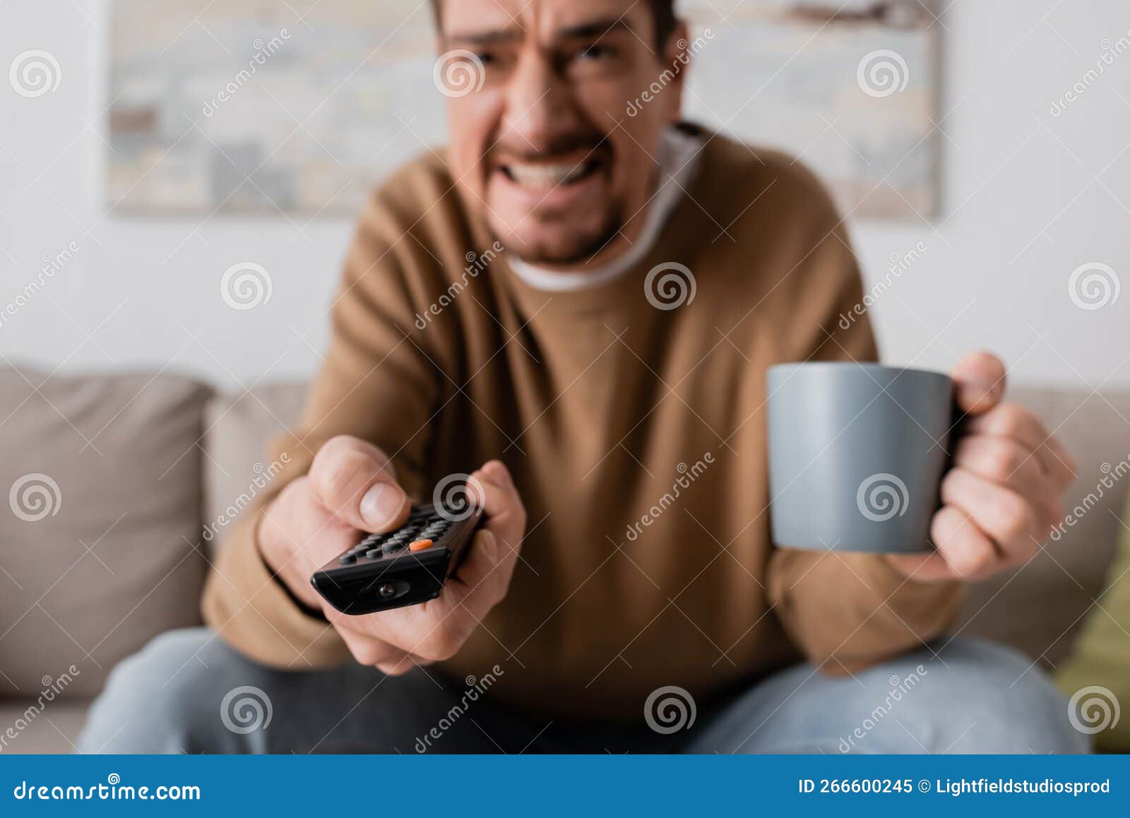 Angry Man Holding Remote Controller and Stock Image - Image of casual ...