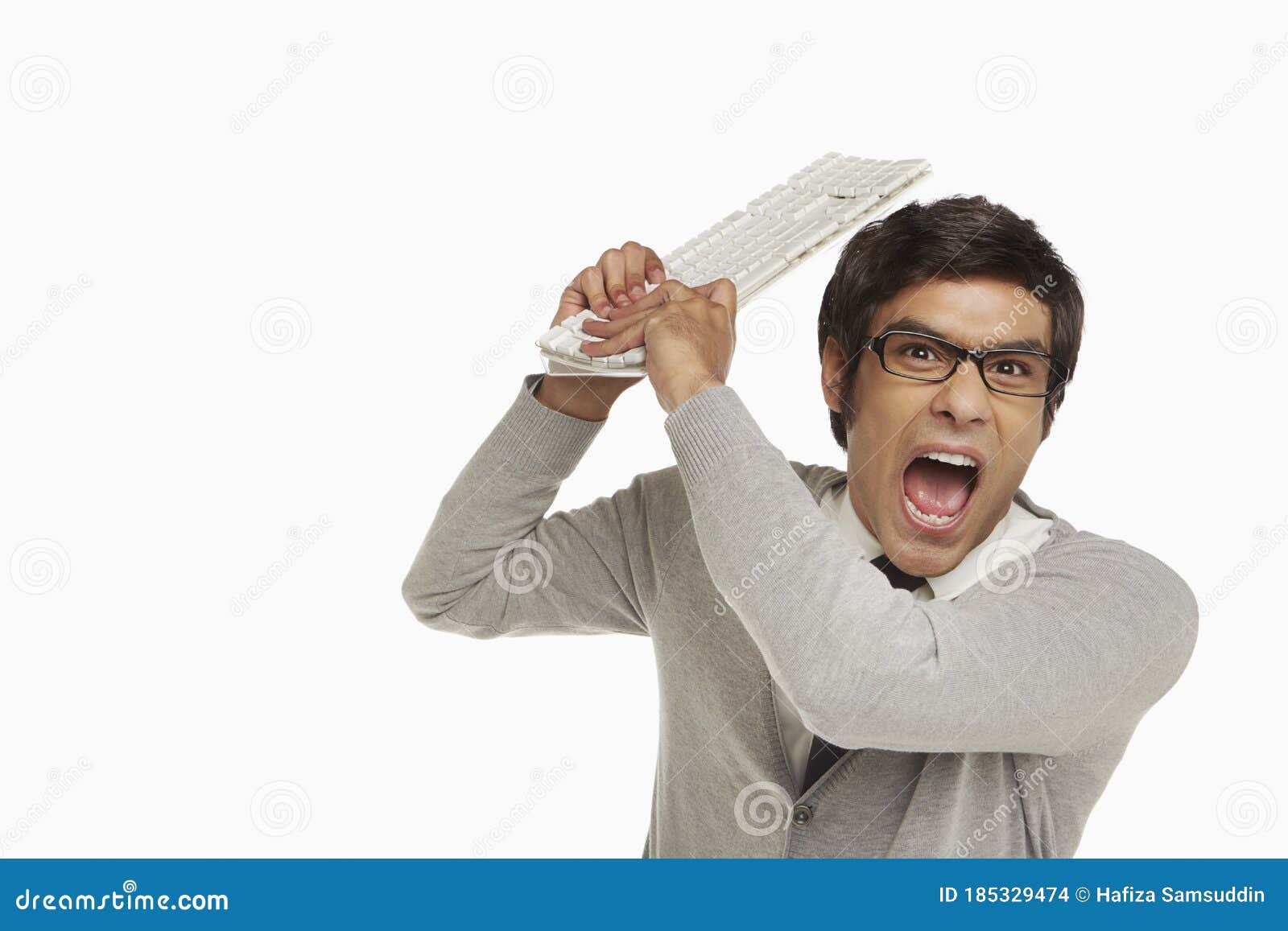 Angry Man Holding Up a Computer Keyboard Stock Photo - Image of ...