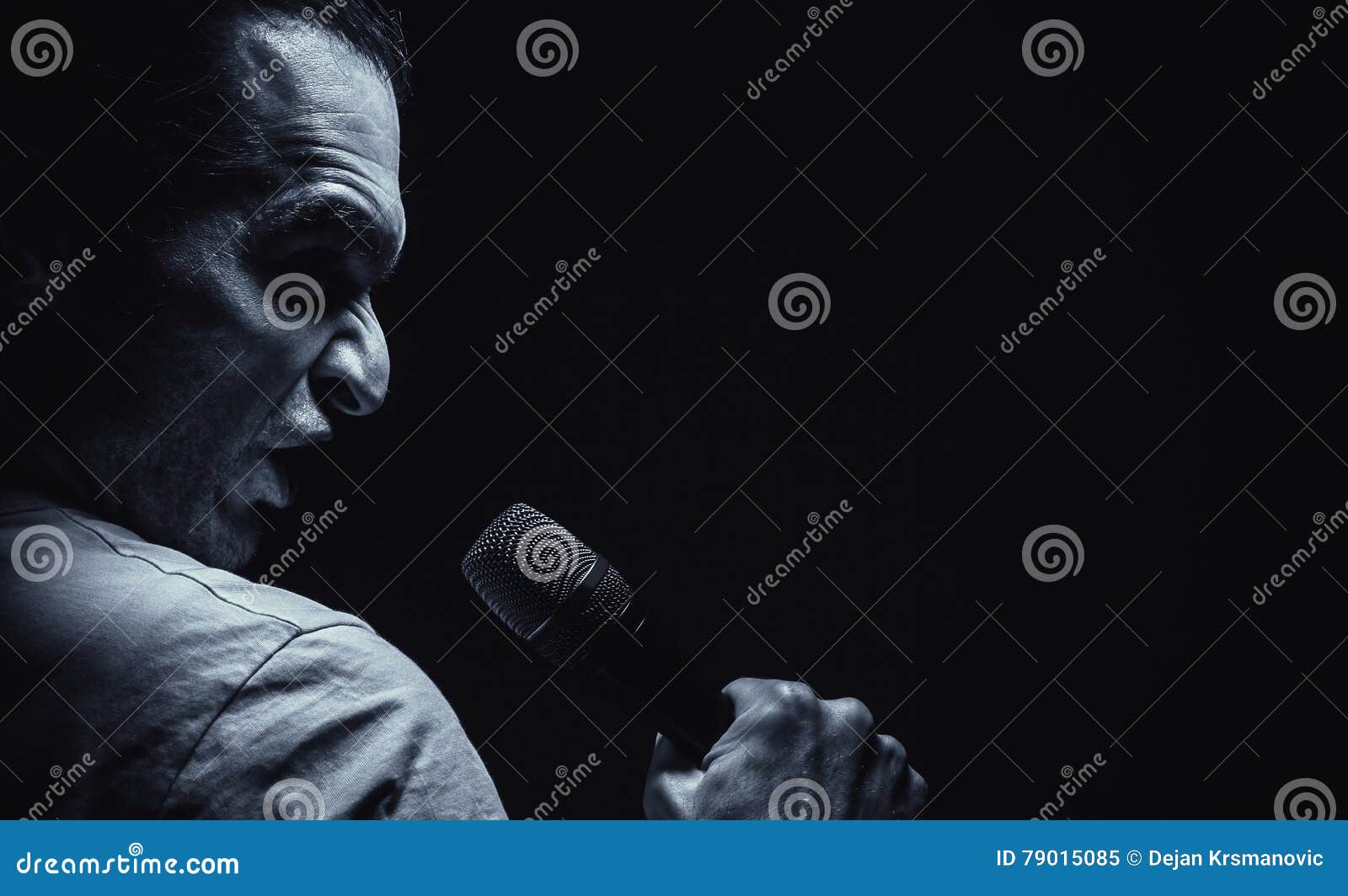 Angry Man with Microphone stock image. Image of loud - 79015085