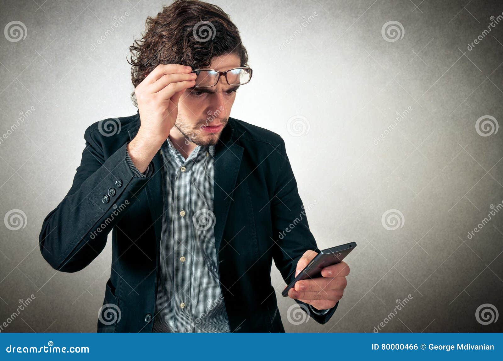Angry man on phone stock photo. Image of cellphone, mobile - 80000466