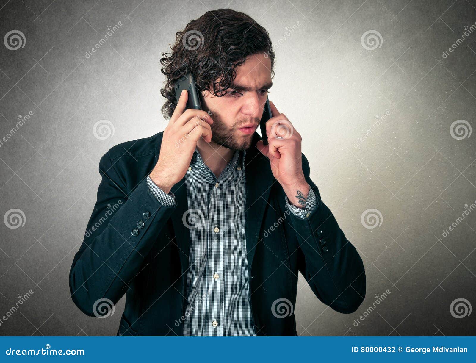 Angry man on phones stock photo. Image of screaming, mobile - 80000432