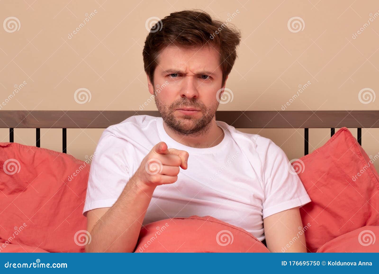 Angry Man Pointing His Finger at You Sitting in the Bed at Home Stock ... Angry Man Pointing His Finger at You Sitting in the Bed at Home Stock ...