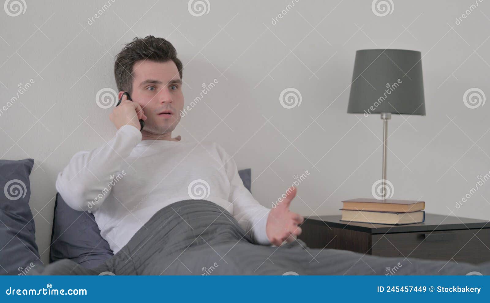 Angry Man Talking on Phone in Bed Stock Image - Image of screaming ...