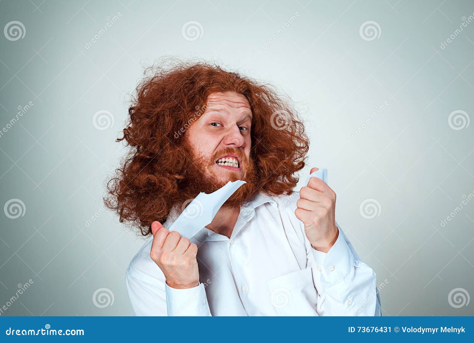 Angry man tear out paper stock image. Image of elegance - 73676431