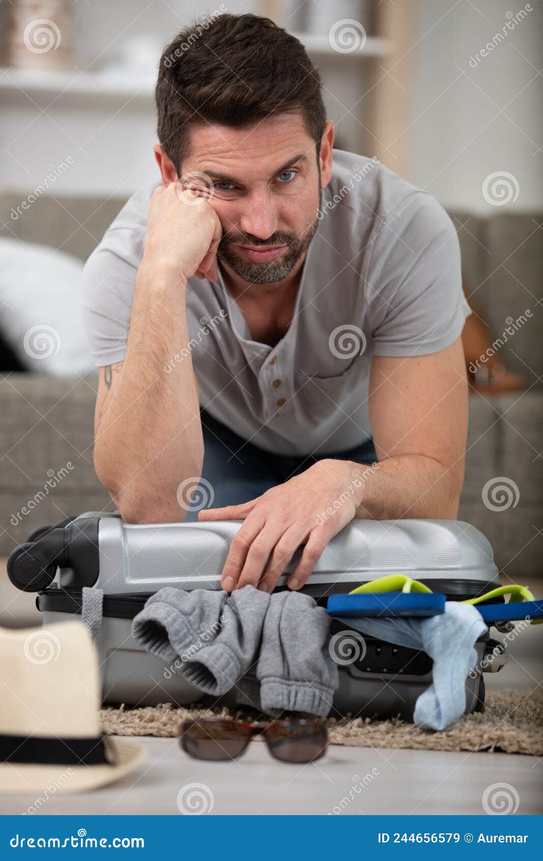 Angry Man Tries To Pack All Necessary for Travel Stock Image - Image of ...