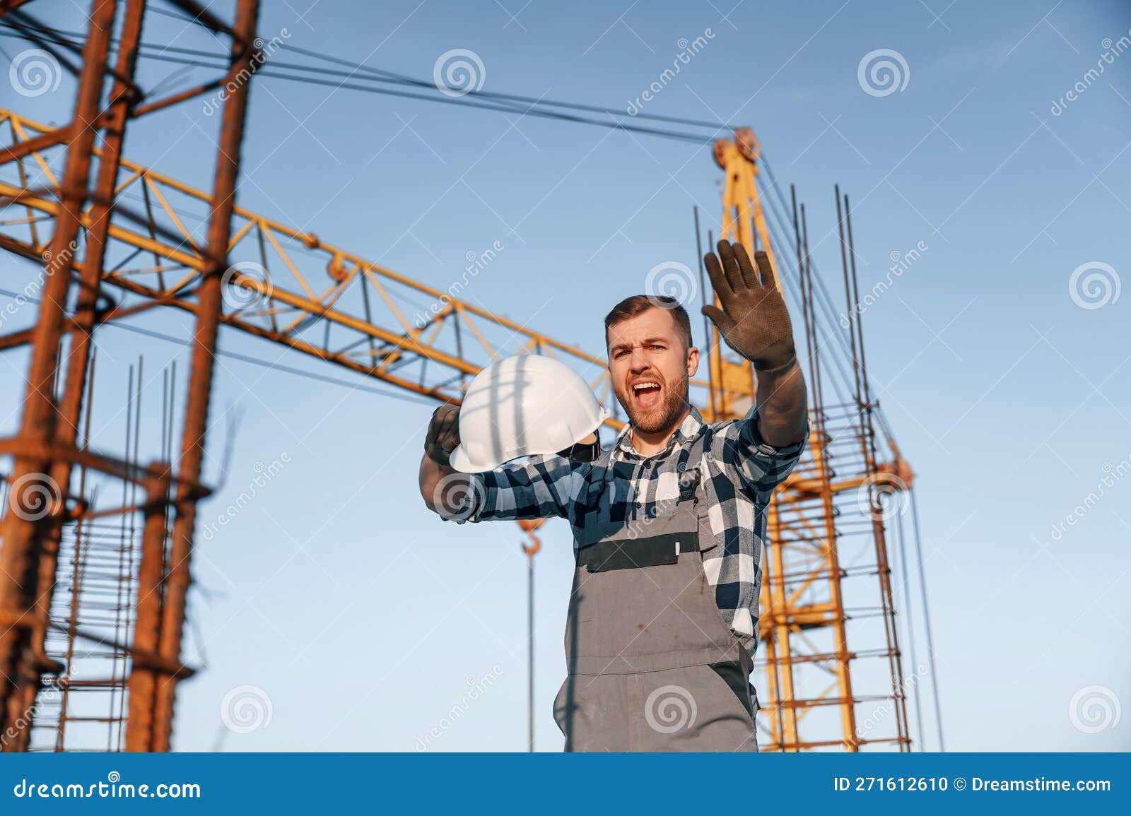 Angry Man is Working on the Construction Site at Daytime Stock Photo ...