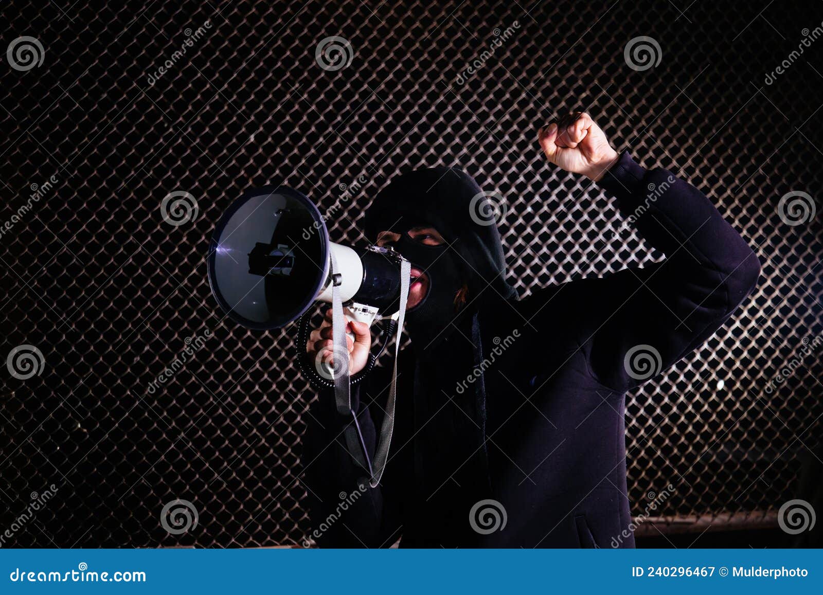 Angry Masked Man is Shouting into the Megaphone Stock Image - Image of ...