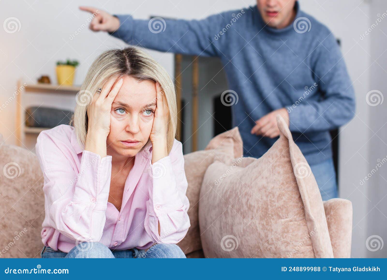 Angry Middle Aged Couple Arguing Shouting Blaming Each Other Of Problem