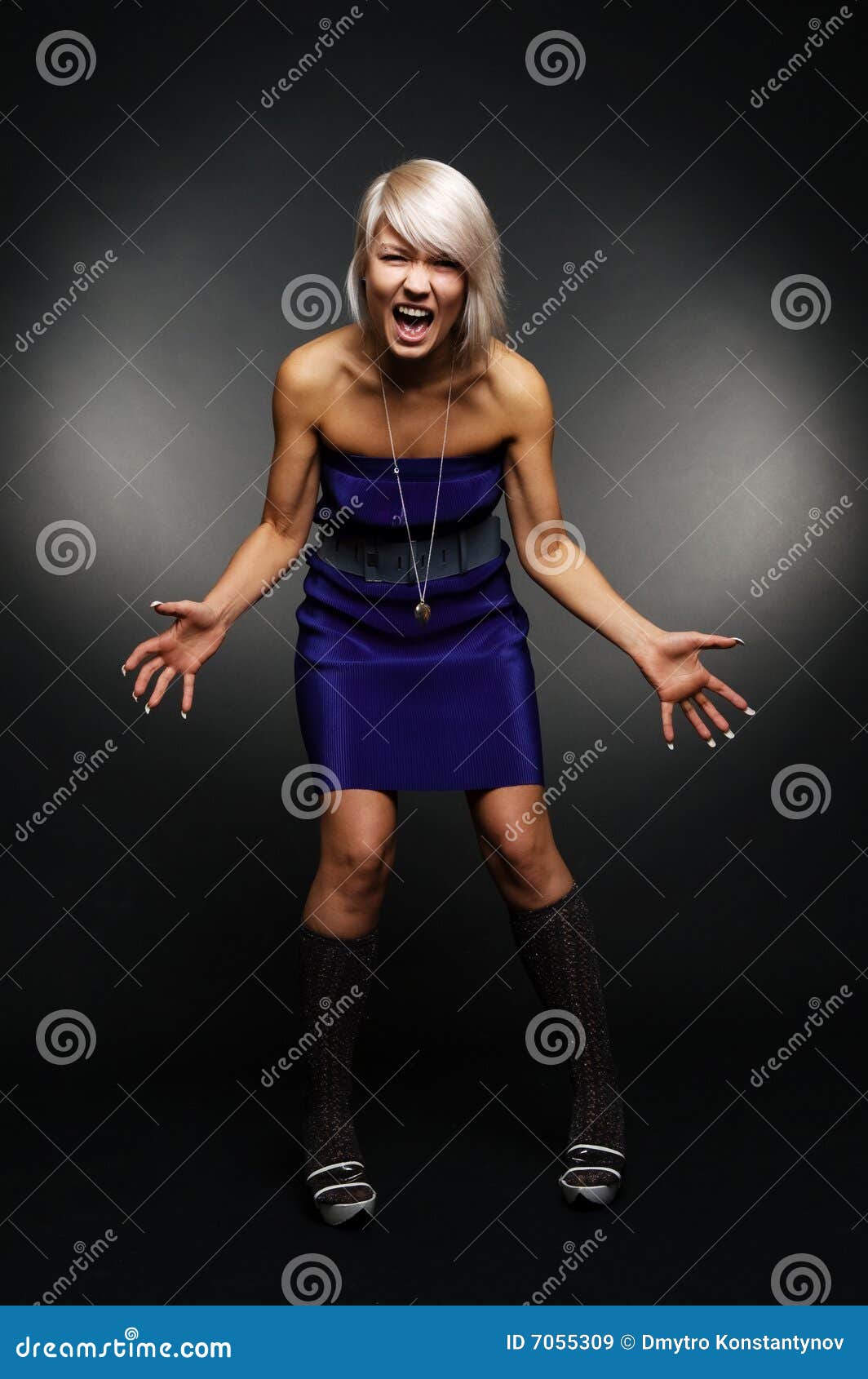 Angry Model Against Dark Background Stock Image - Image of evening ...