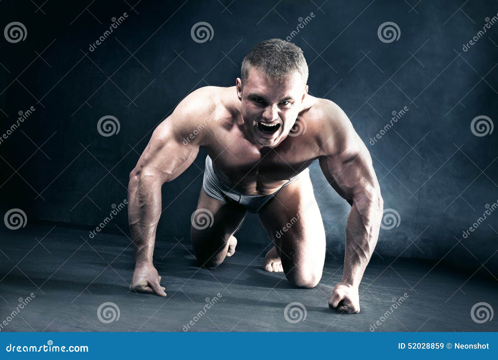 Angry muscular man. stock image. Image of bodybuilding - 52028859