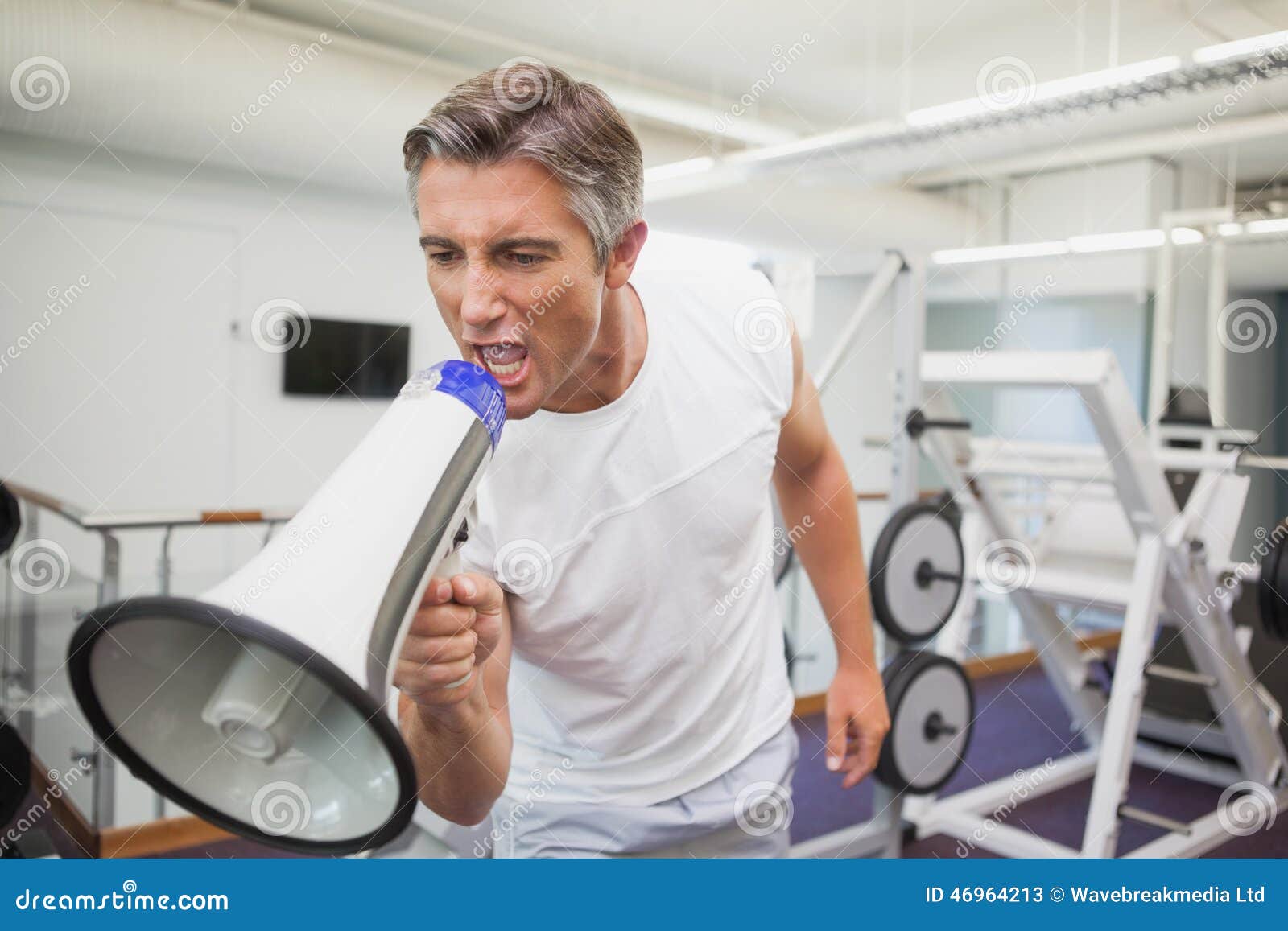 Angry Personal Trainer Shouting through Megaphone Stock Image - Image ...