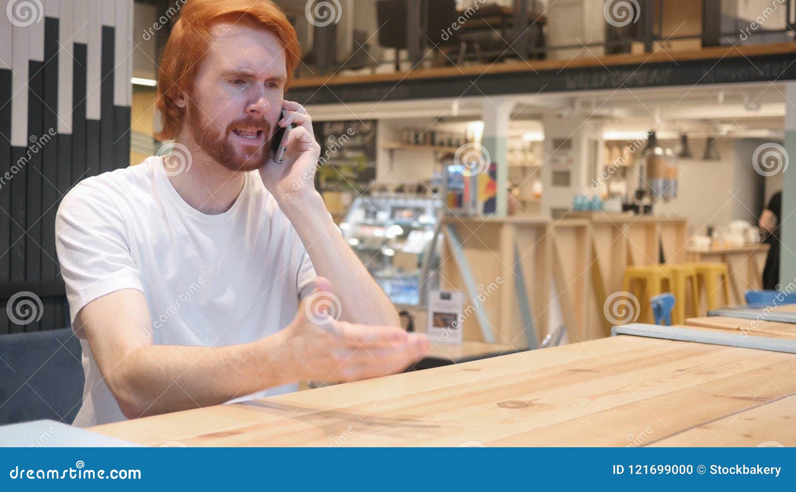 Angry Redhead Man Talking on Mobile Phone Stock Photo - Image of ...