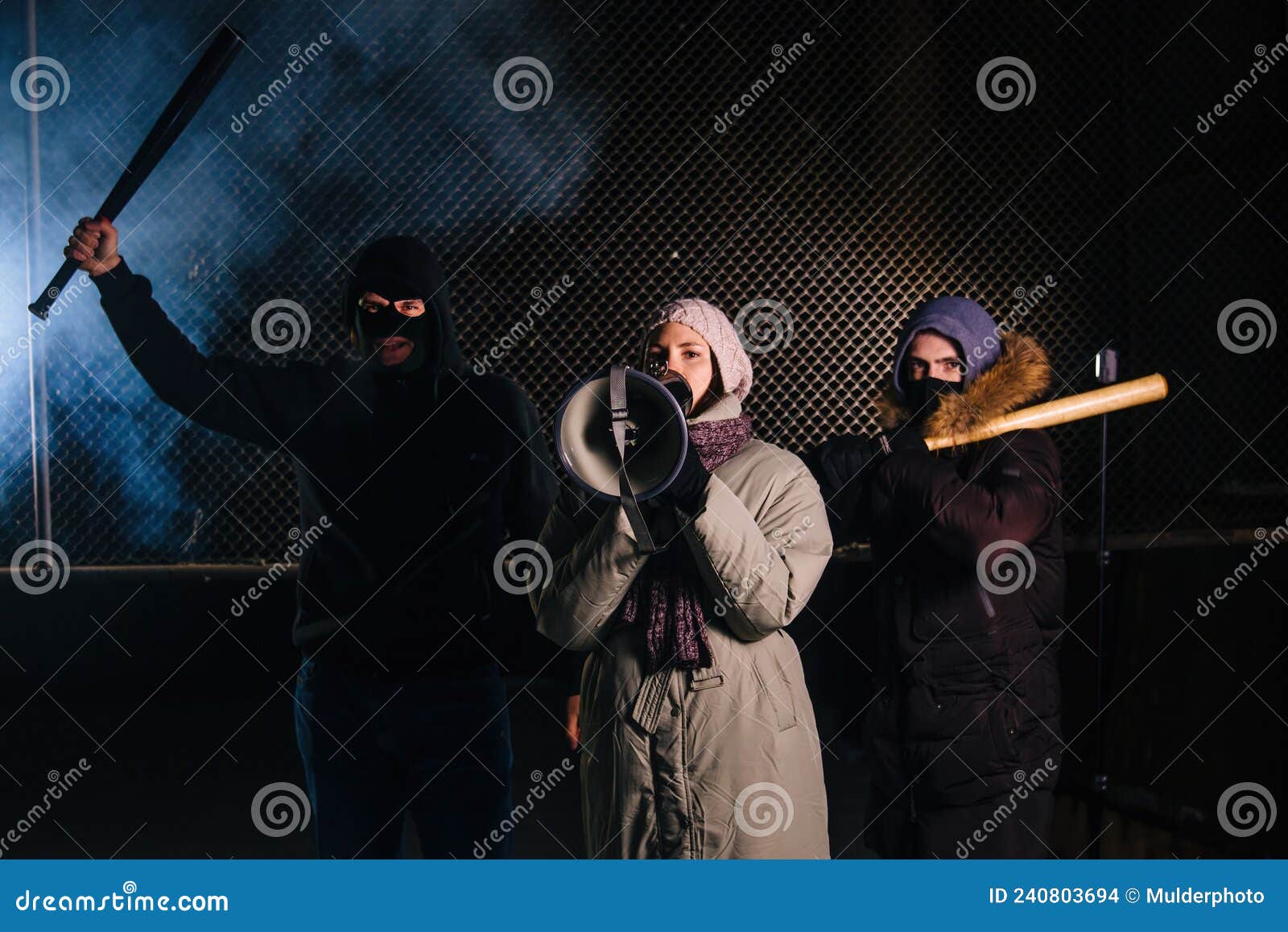 Angry Riots with a Bat and Megaphone, Revolt Concept Stock Photo ...