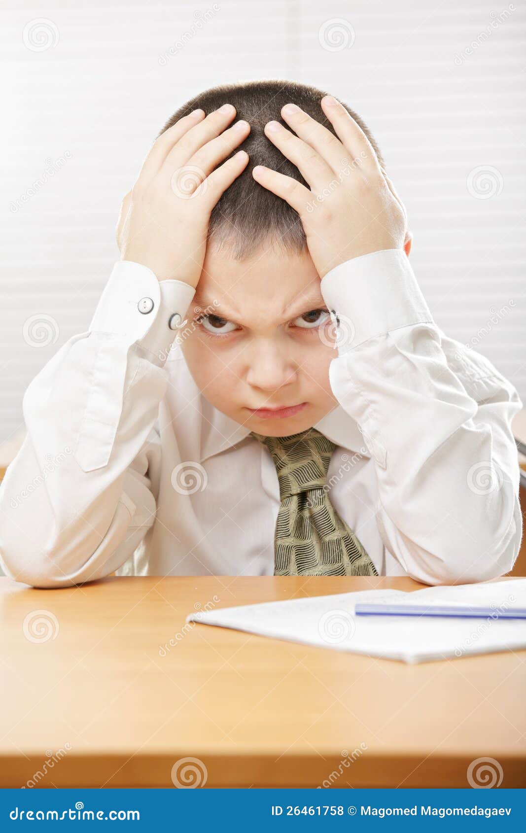 Angry schoolboy stock photo. Image of pupil, schoolboy - 26461758