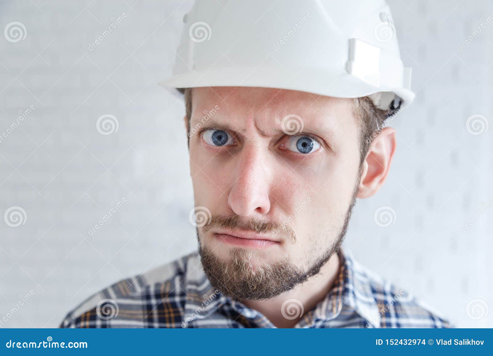 Angry or Serious Engineer in White Helmet Stock Photo - Image of ...