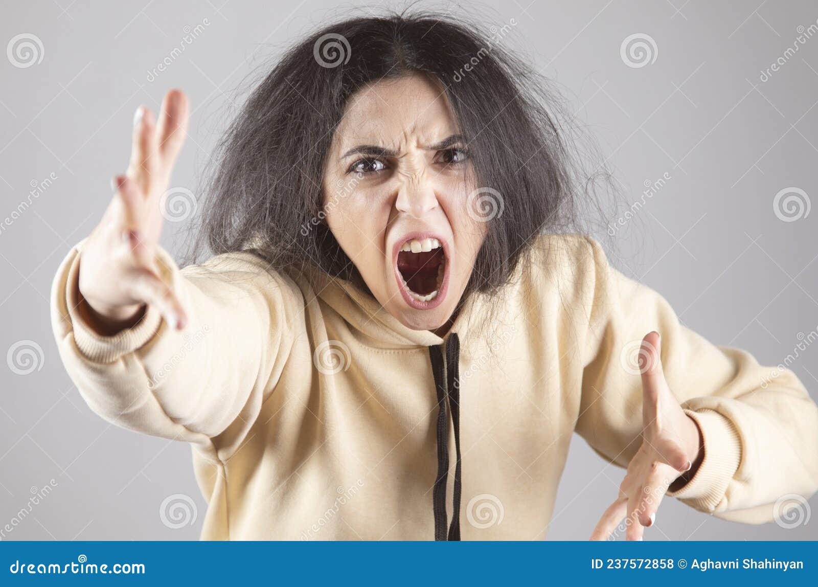 Angry and shouting woman stock photo. Image of beautiful - 237572858