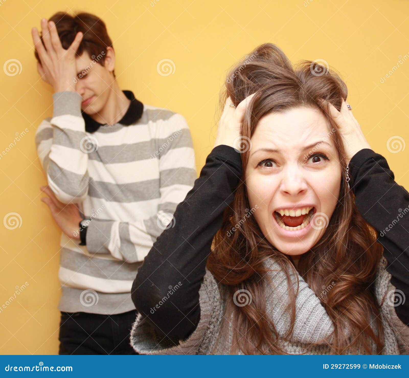 Angry Siblings Sitting Arms Crossed With Sad Mother On Sofa Royalty ...