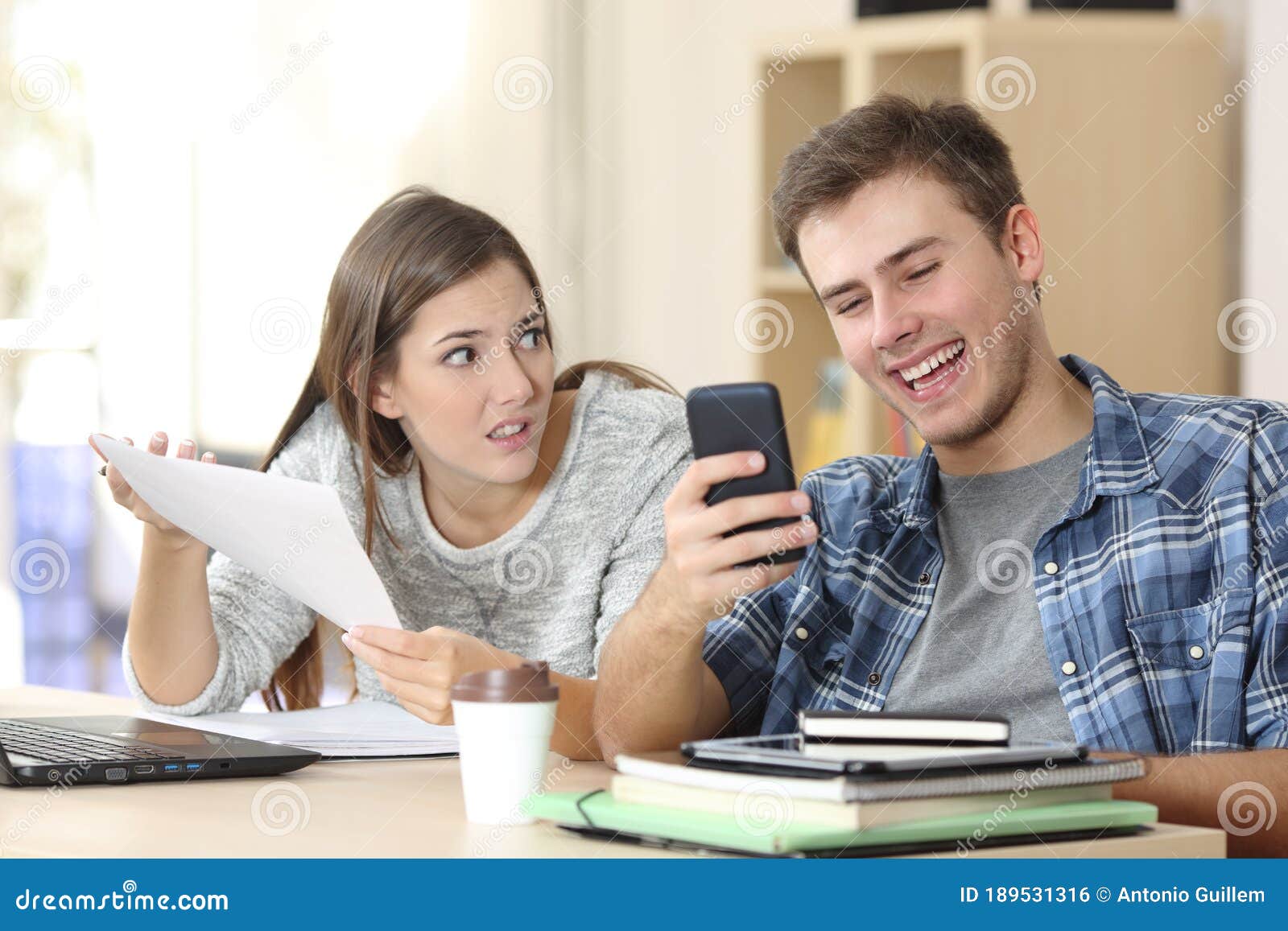 Angry Student Complaining To Slacker Classmate at Home Stock Photo ...
