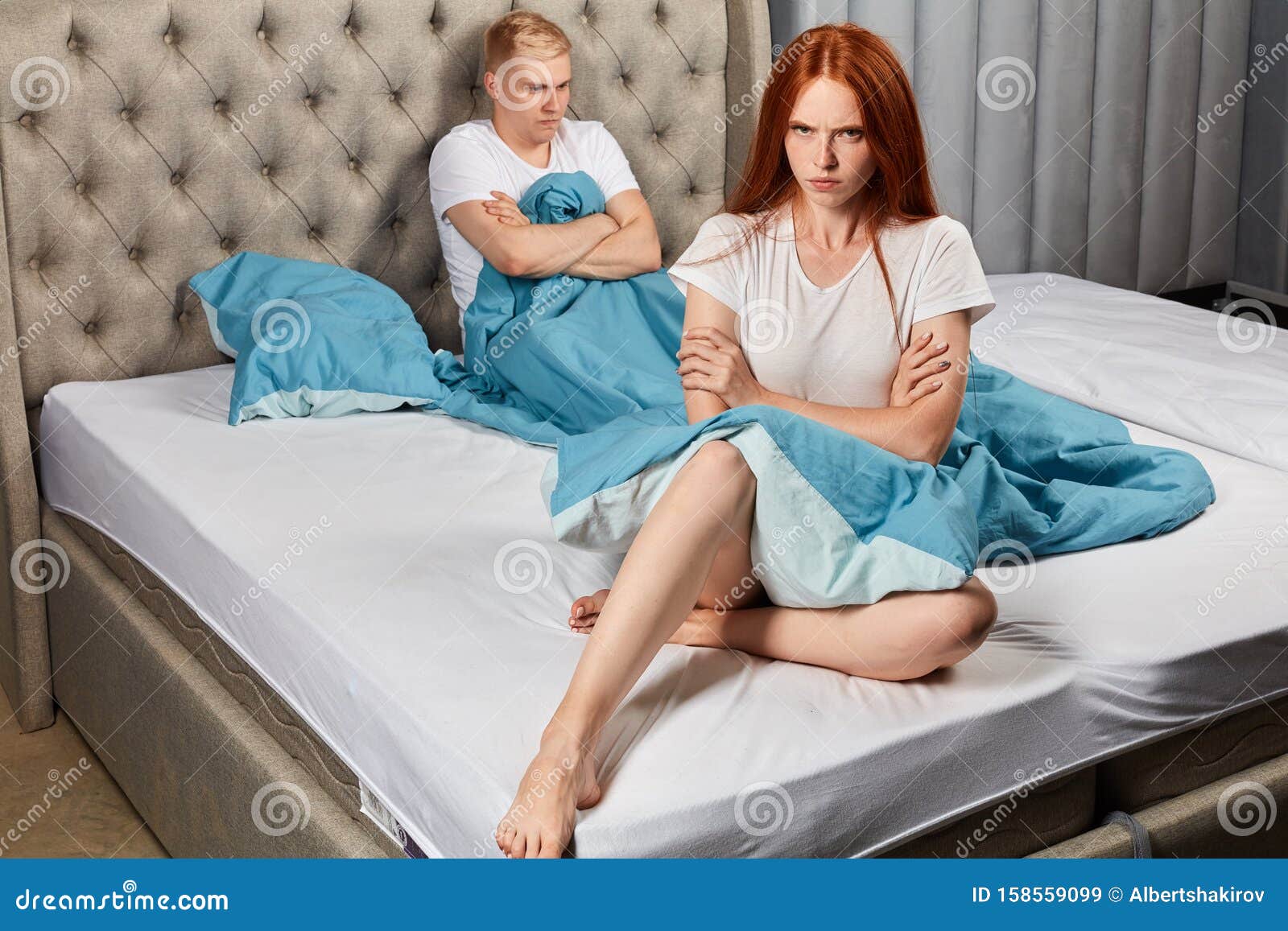 Angry Unhappy Couple Isn`t Talking After Argument In Bed At Home In