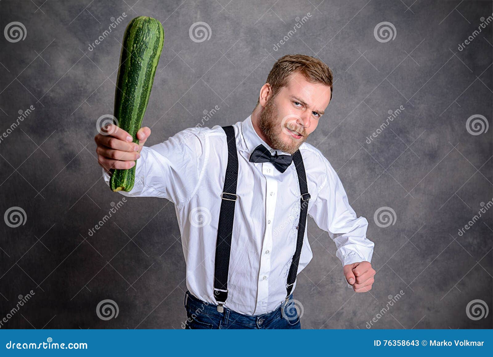 Angry Vegetarian Minatory with Zucchini Cudgel Stock Image - Image of ...