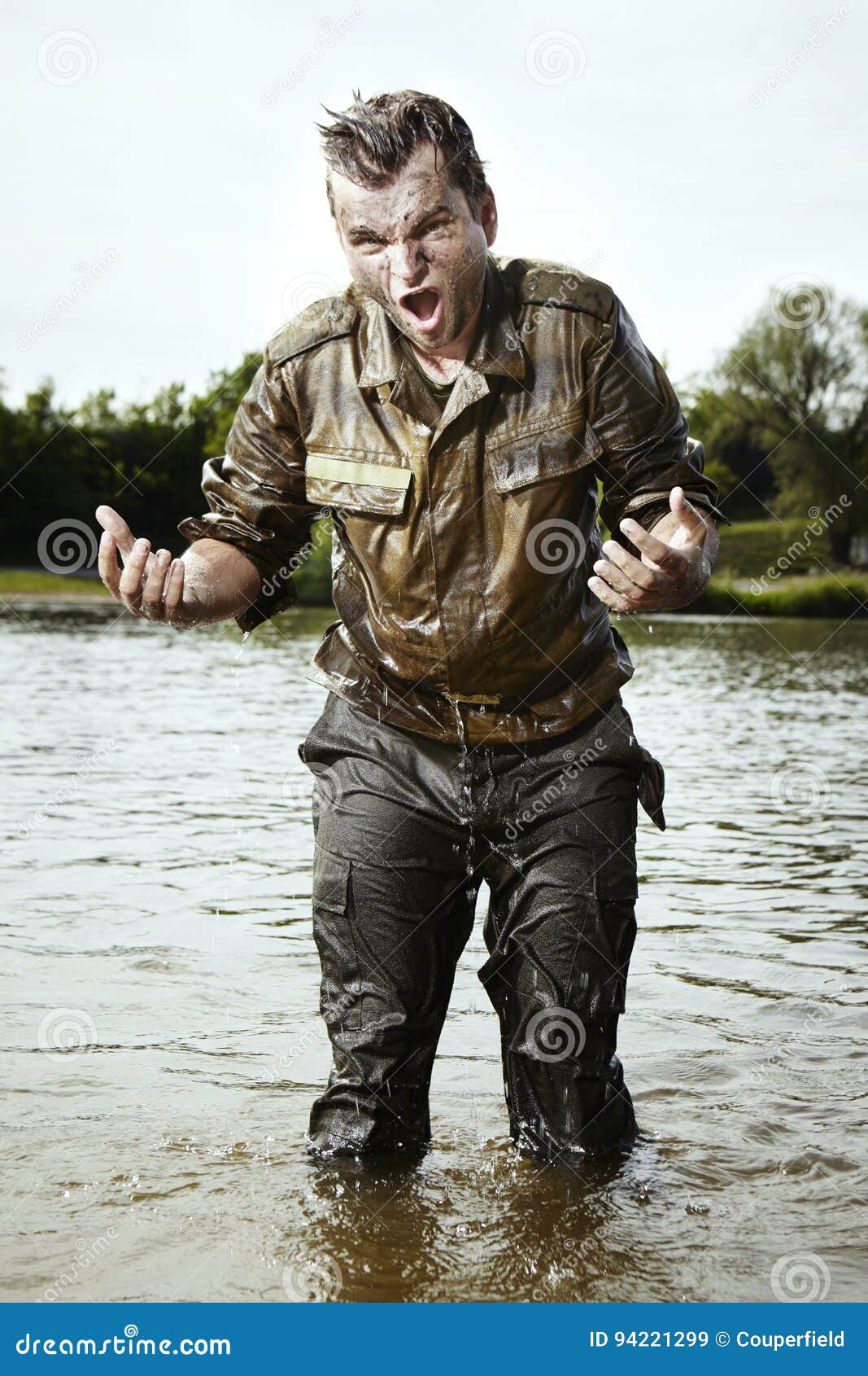 Angry wet soldier in river stock image. Image of emotional - 94221299