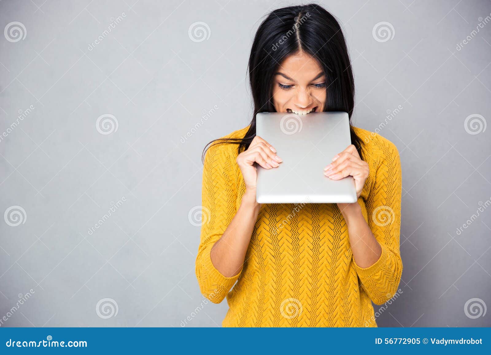 Angry Woman Biting Tablet Computer Stock Image - Image of people ...