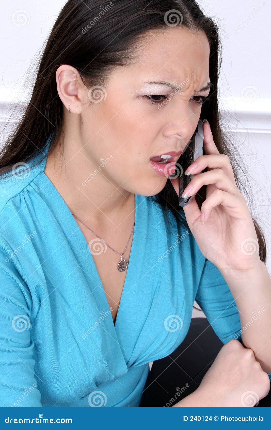 Angry Woman on Cellphone stock photo. Image of hair, scream - 240124