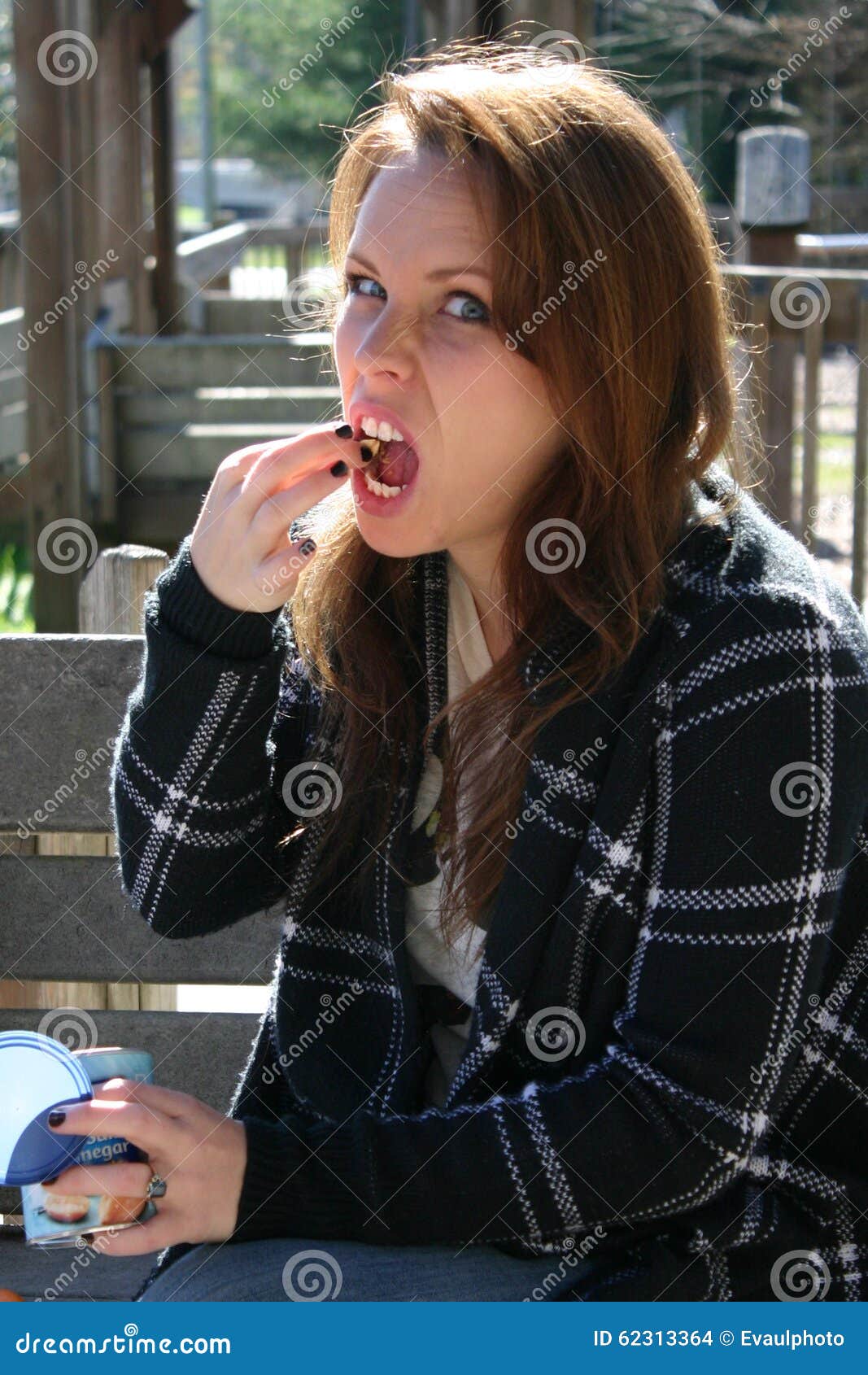 Angry Woman Eating stock photo. Image of eating, expression - 62313364
