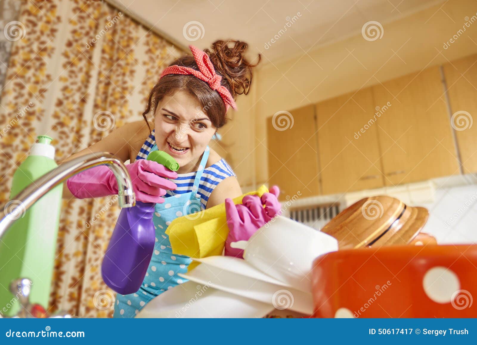 Angry woman in the kitchen stock image. Image of mopping - 50617417