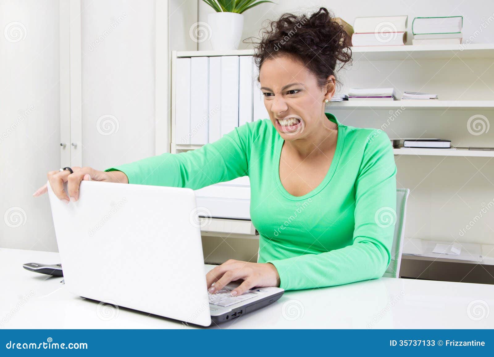 Angry woman with laptop stock image. Image of laptop - 35737133
