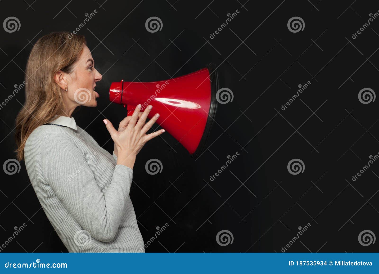 Angry Woman Shouting With Loudspeaker Megaphone On Black Background ... Angry Woman Shouting With Loudspeaker Megaphone On Black Background ...