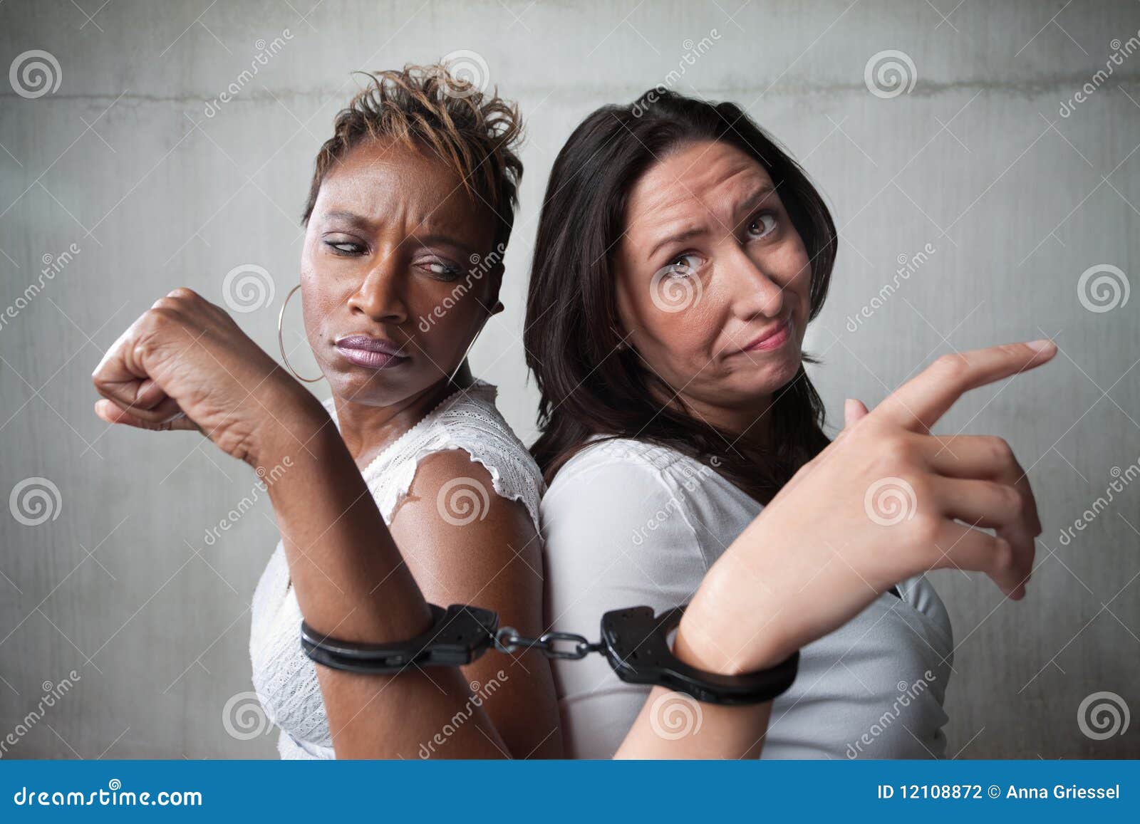 Angry women in handcuffs stock photo. Image of jail, mean - 12108872