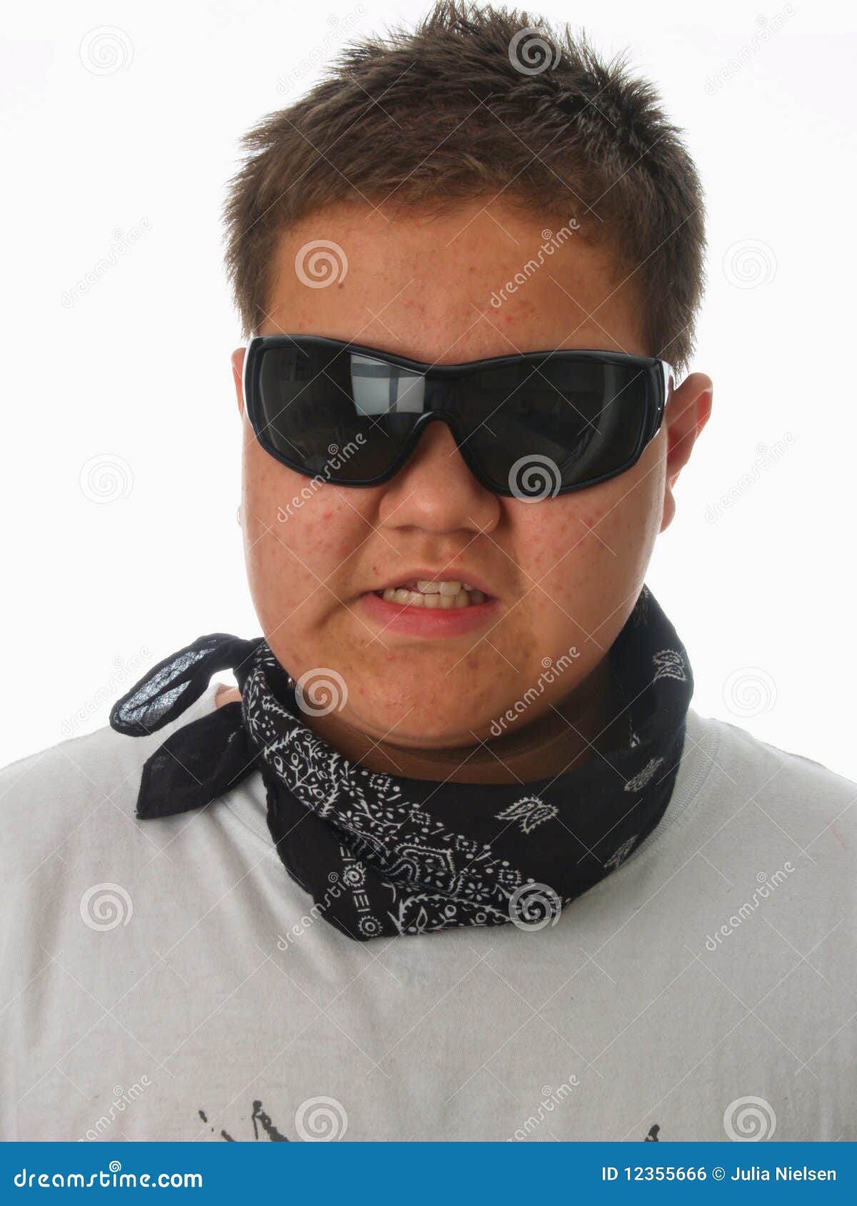 Angry Young boy with cap stock photo. Image of style - 12355666