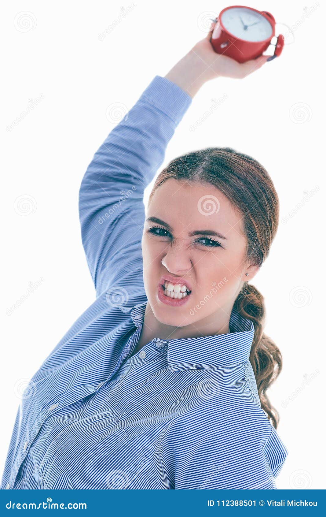 Angry Young Caucasian Woman Throwing an Alarm Clock Isolated in White ... Angry Young Caucasian Woman Throwing an Alarm Clock Isolated in White ...