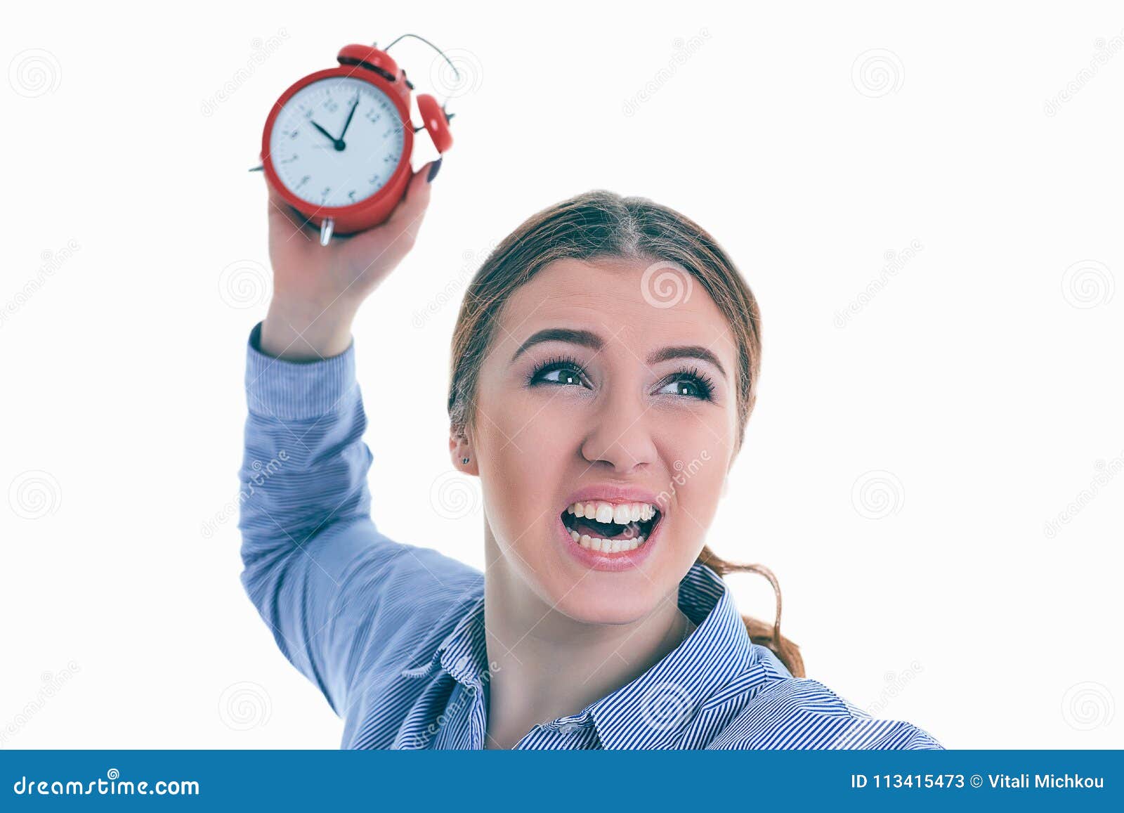 Angry Young Caucasian Woman Throwing An Alarm Clock Isolated In White ... Angry Young Caucasian Woman Throwing An Alarm Clock Isolated In White ...