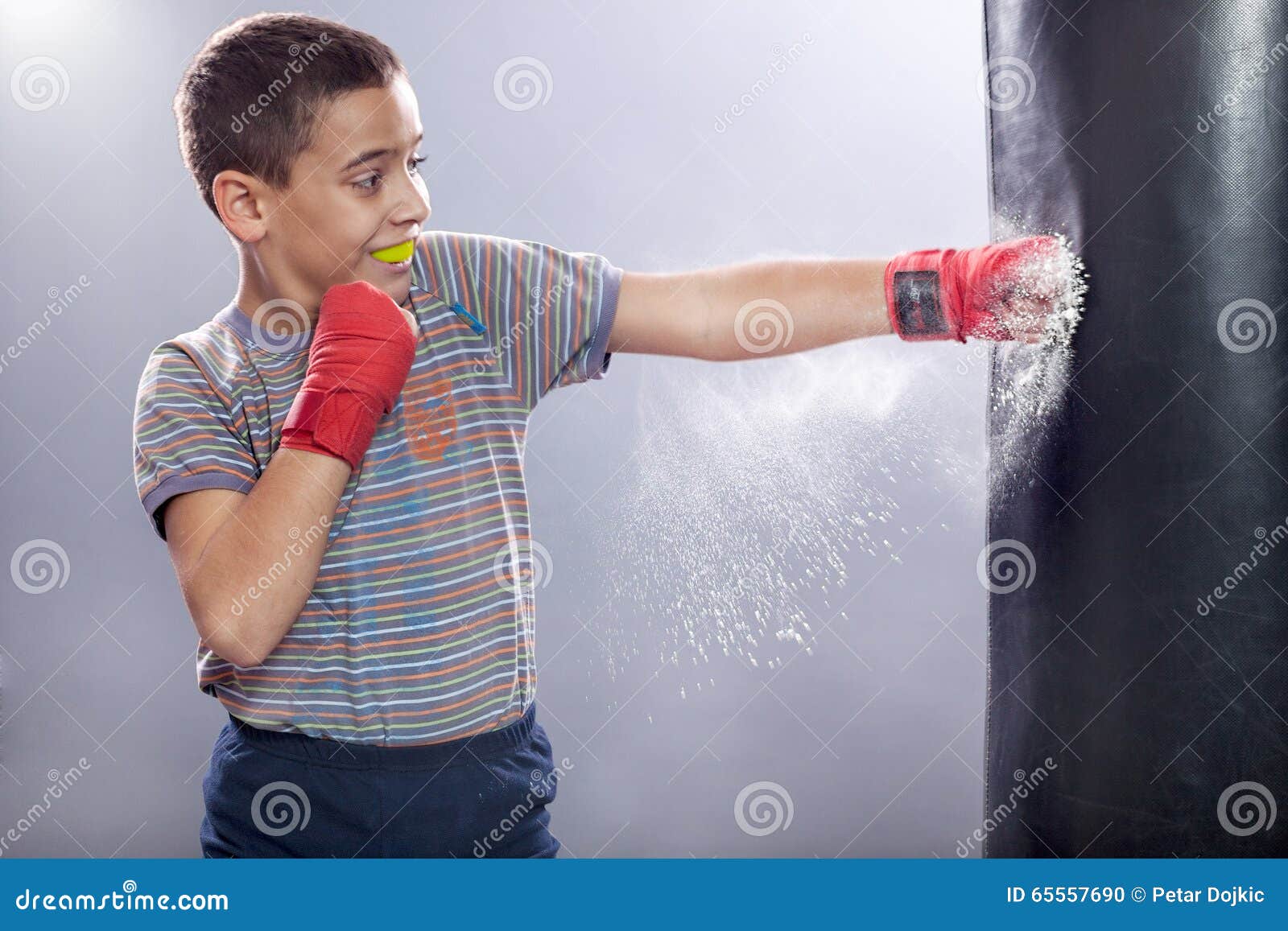 Angry Young Child Boxing in Bag Stock Photo - Image of athlete, boxing ...