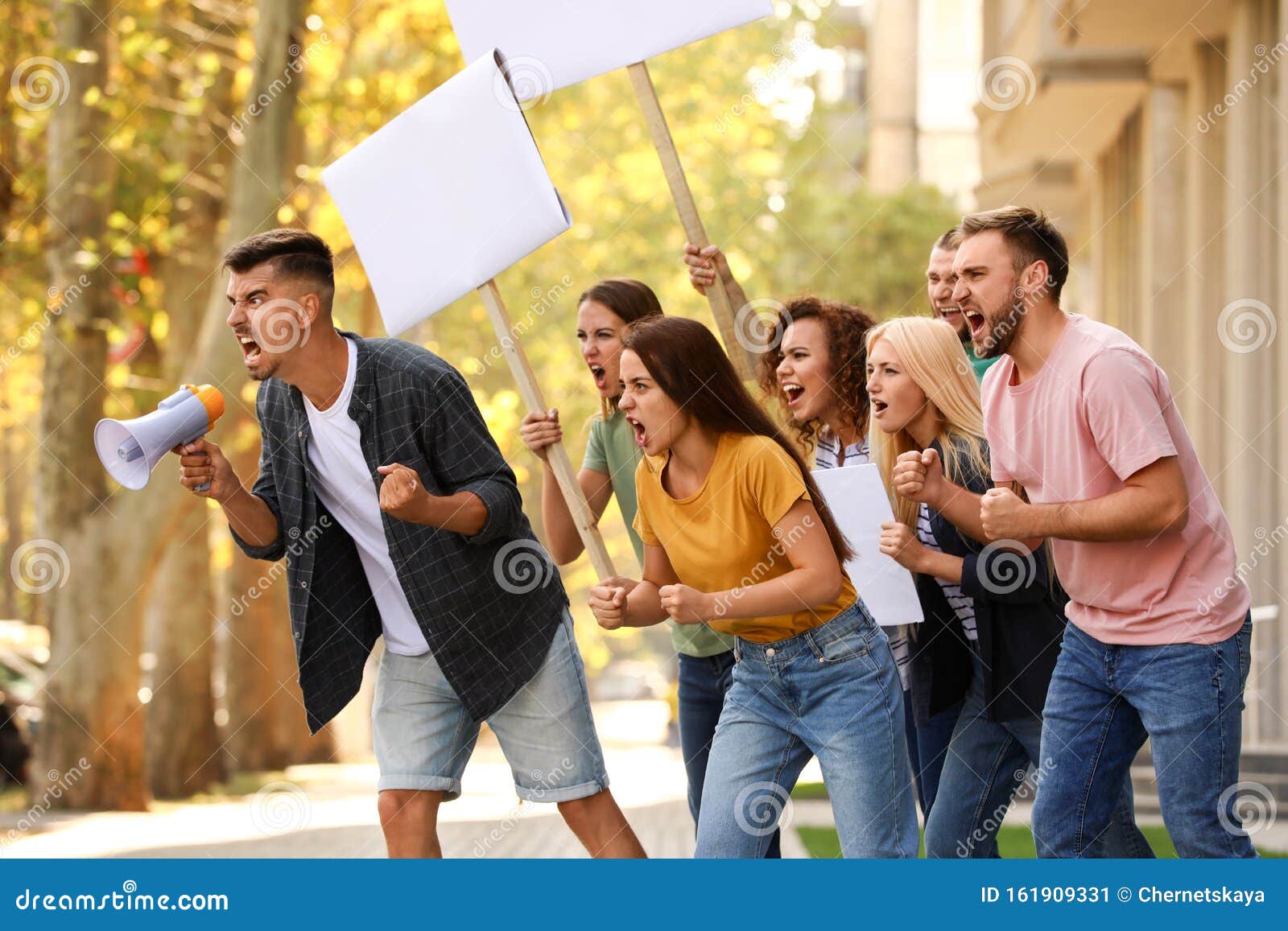 Angry Young Man with Megaphone Leading Protest Stock Image - Image of ... Angry Young Man with Megaphone Leading Protest Stock Image - Image of ...