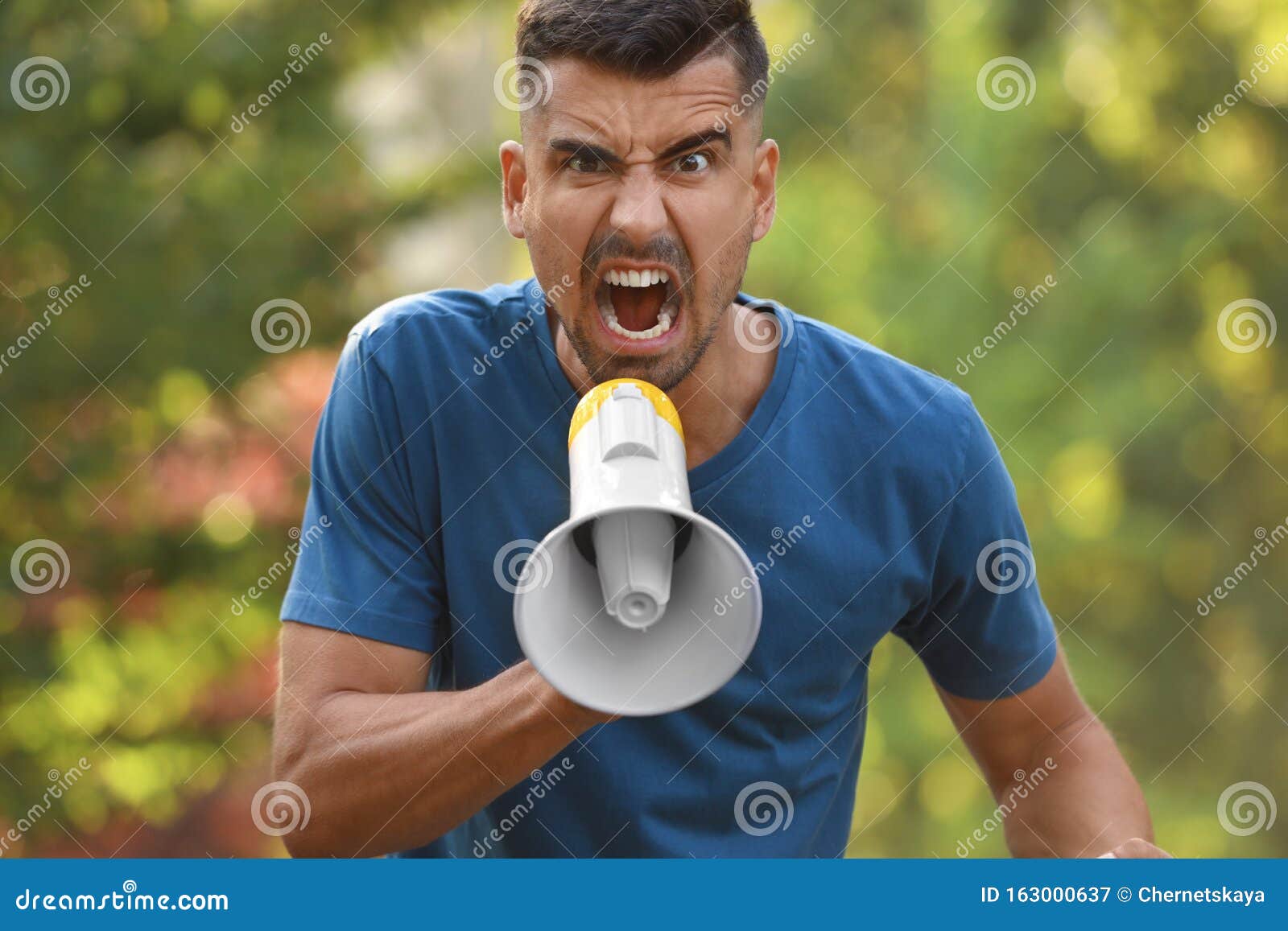 Angry Young Man with Megaphone. Protest Leader Stock Image - Image of ... Angry Young Man with Megaphone. Protest Leader Stock Image - Image of ...