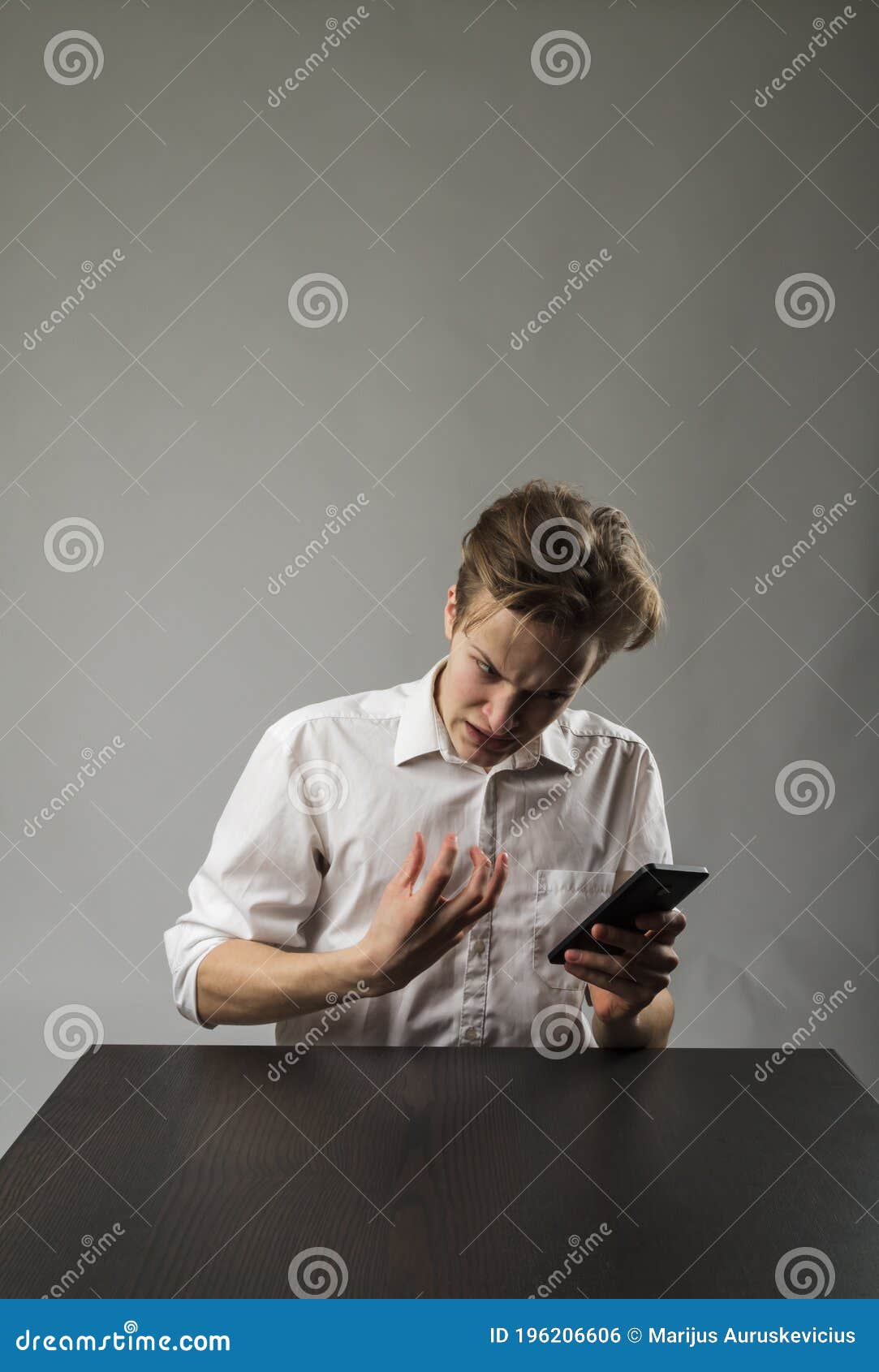 Angry Young Man on the Phone Stock Photo - Image of look, explanation ...