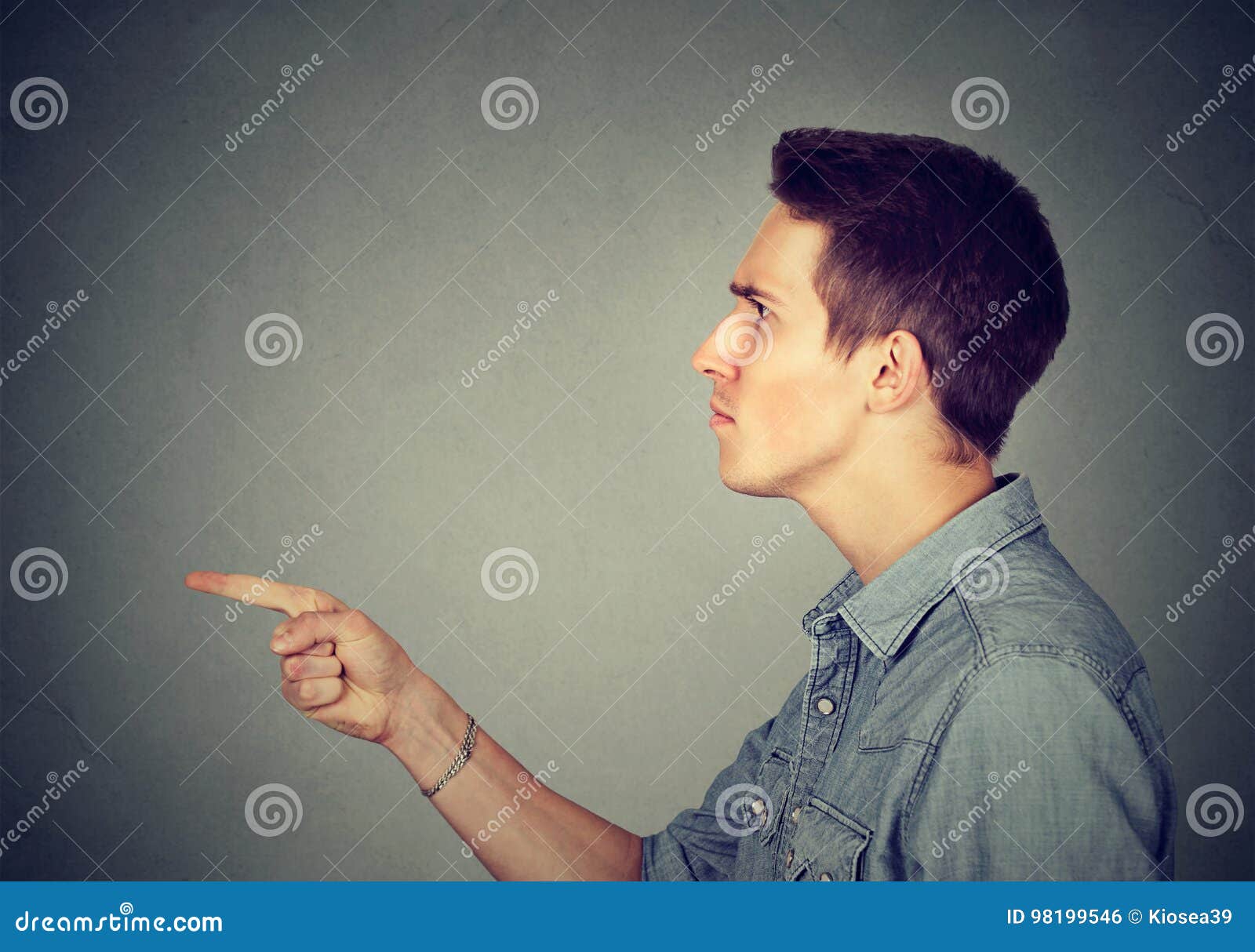 Angry Young Man Pointing Finger at Someone Stock Photo - Image of ...